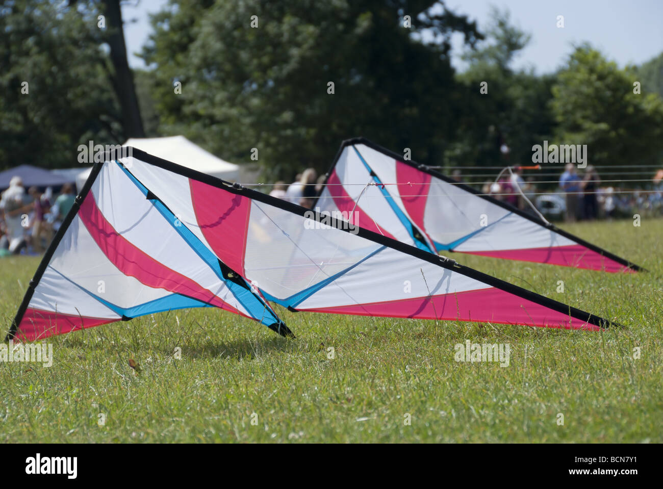 A pair of kites ready to launch at brighton Kite Festival Stock Photo ...