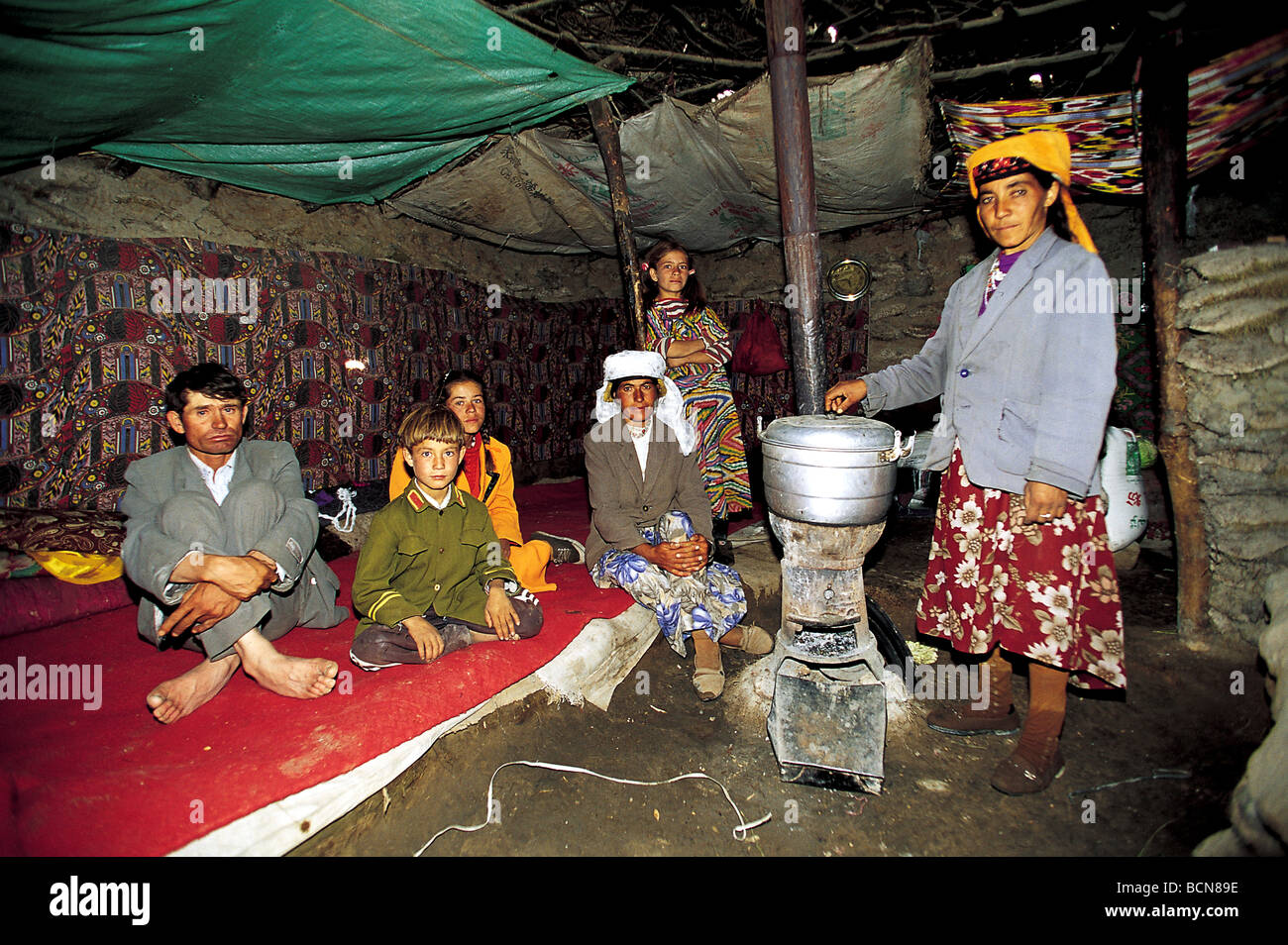 Tajik ethnic minority family in their tent home, Kashgar Prefecture ...