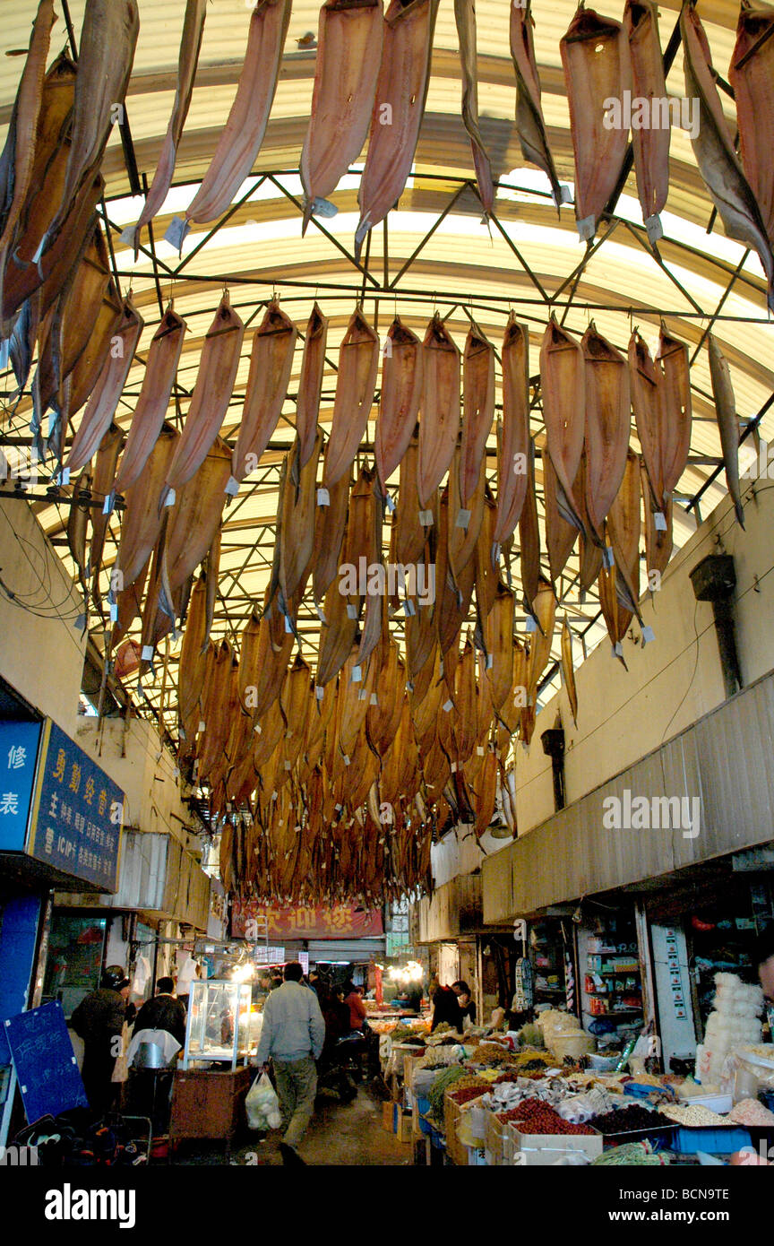 Salted fish hanging to dry in the sun in local farmers market, Shanghai ...