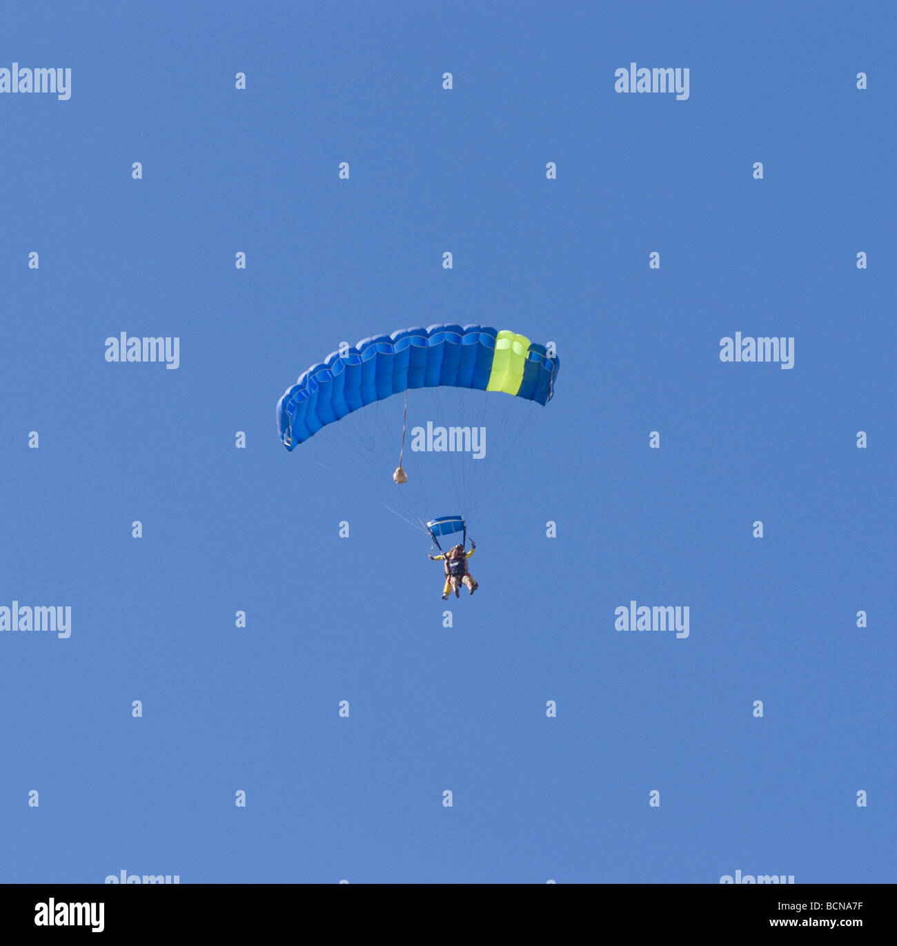 Student Parachutist and Instructor in Single Parachute over Club at ...