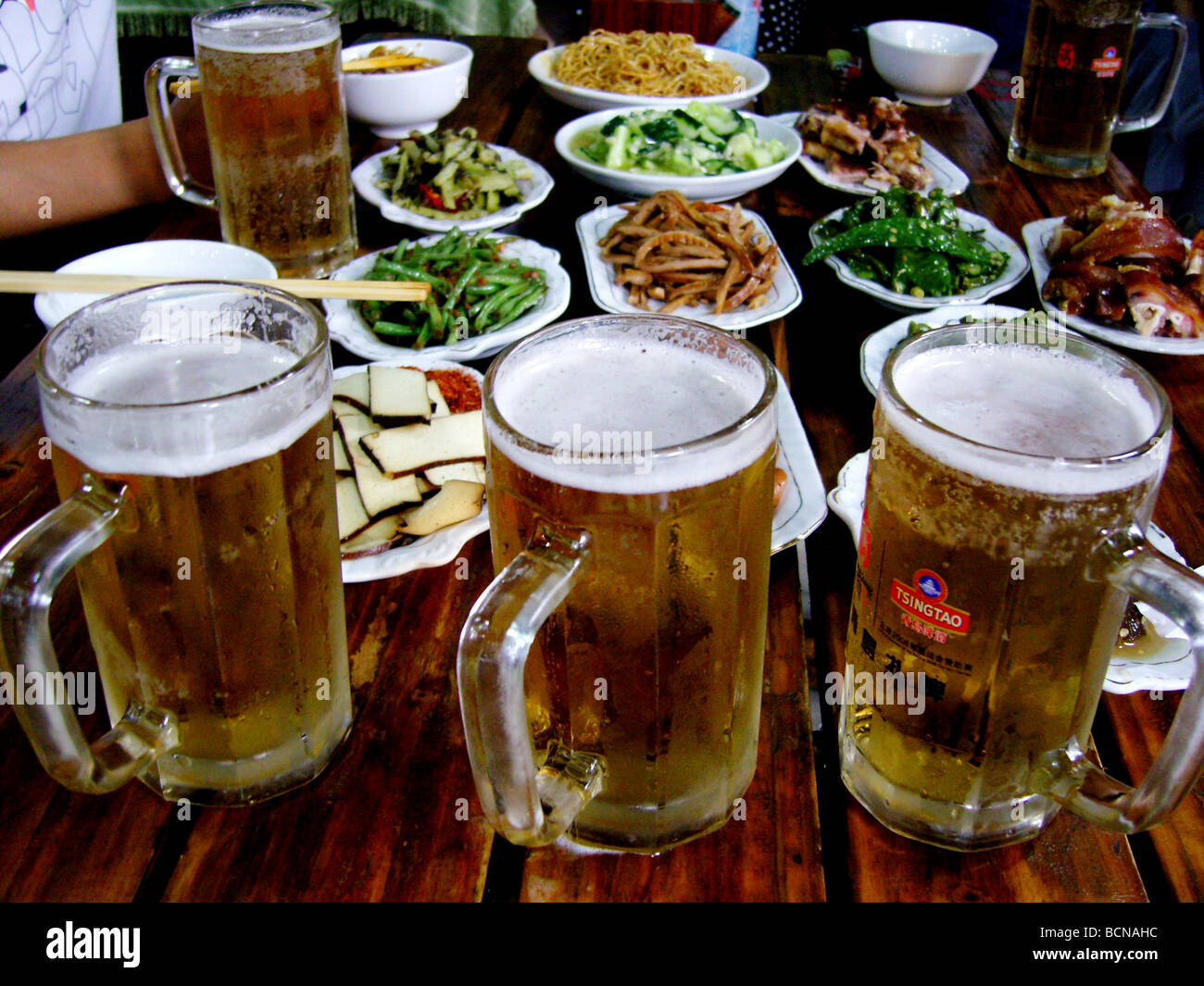 China beer drinking hi-res stock photography and images - Alamy