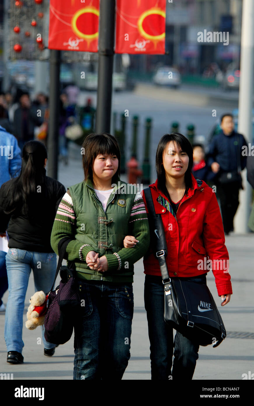 Two trendy Chinese young women, Shanghai, China Stock Photo - Alamy