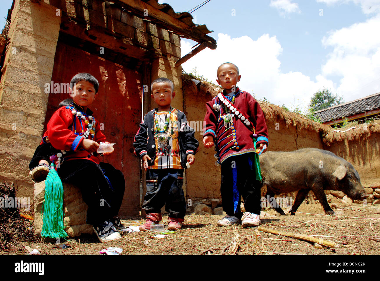 Yi minority children in ethnic costume, Torch Festival, Liangshan Yi ...