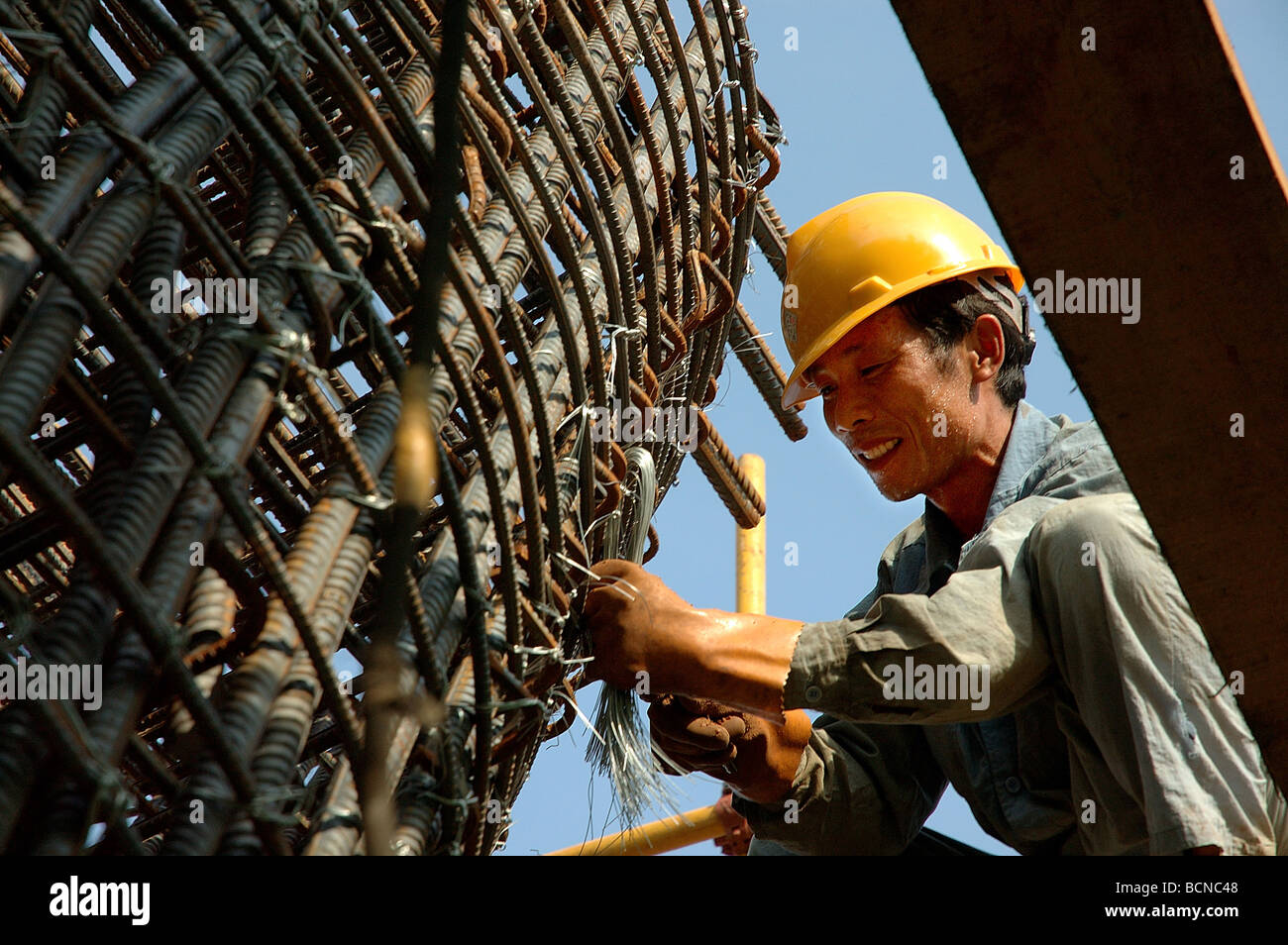 Construction worker working, Shanghai, China Stock Photo - Alamy