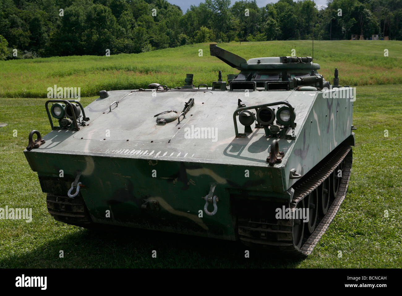 An early model APC is parked after a Vietnam War reenactment Stock ...