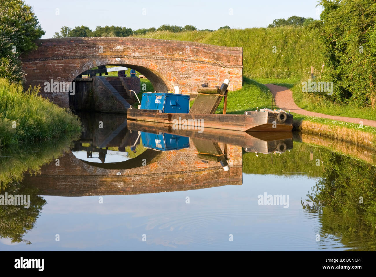 Canal maintenance boat moored on the canal UK Stock Photo - Alamy