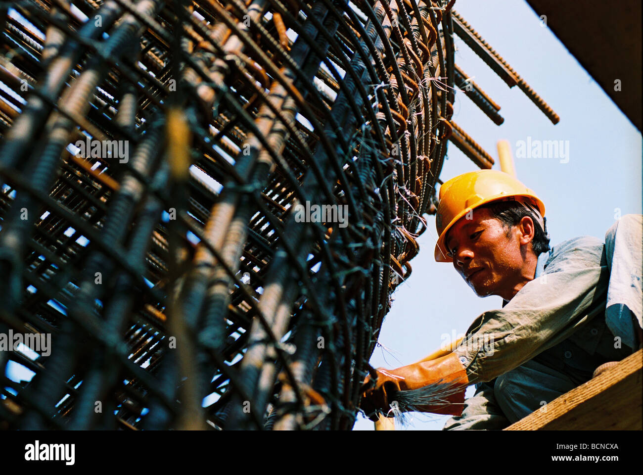 Construction worker working, Shanghai, China Stock Photo - Alamy