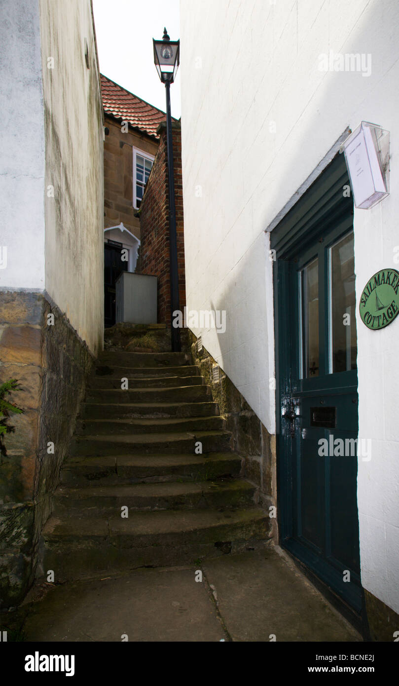 An typical narrow alleyway in "Robin Hoods Bay", North Yorkshire ...