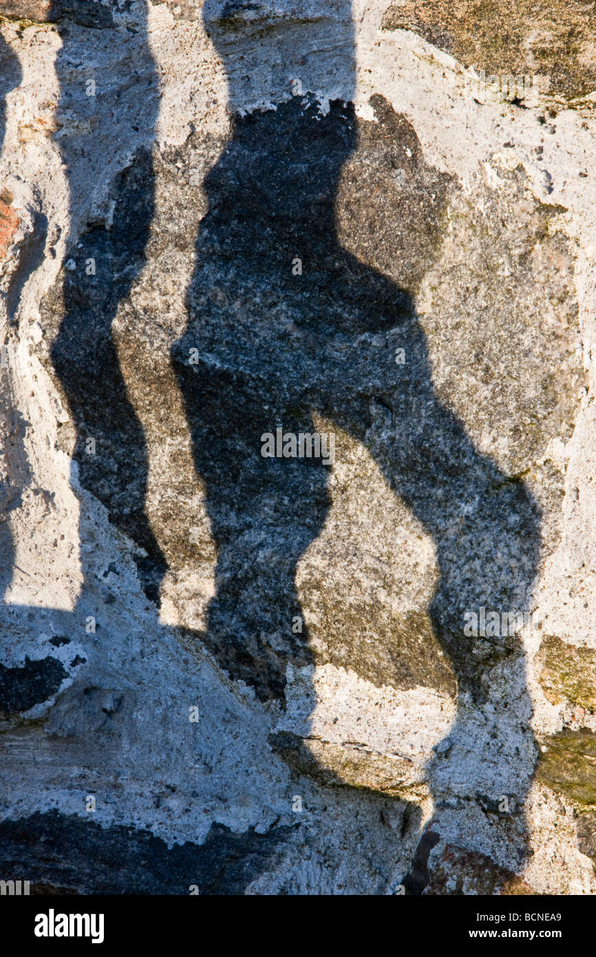 Shadow on rock wall Scotland looking like female figure Stock Photo - Alamy