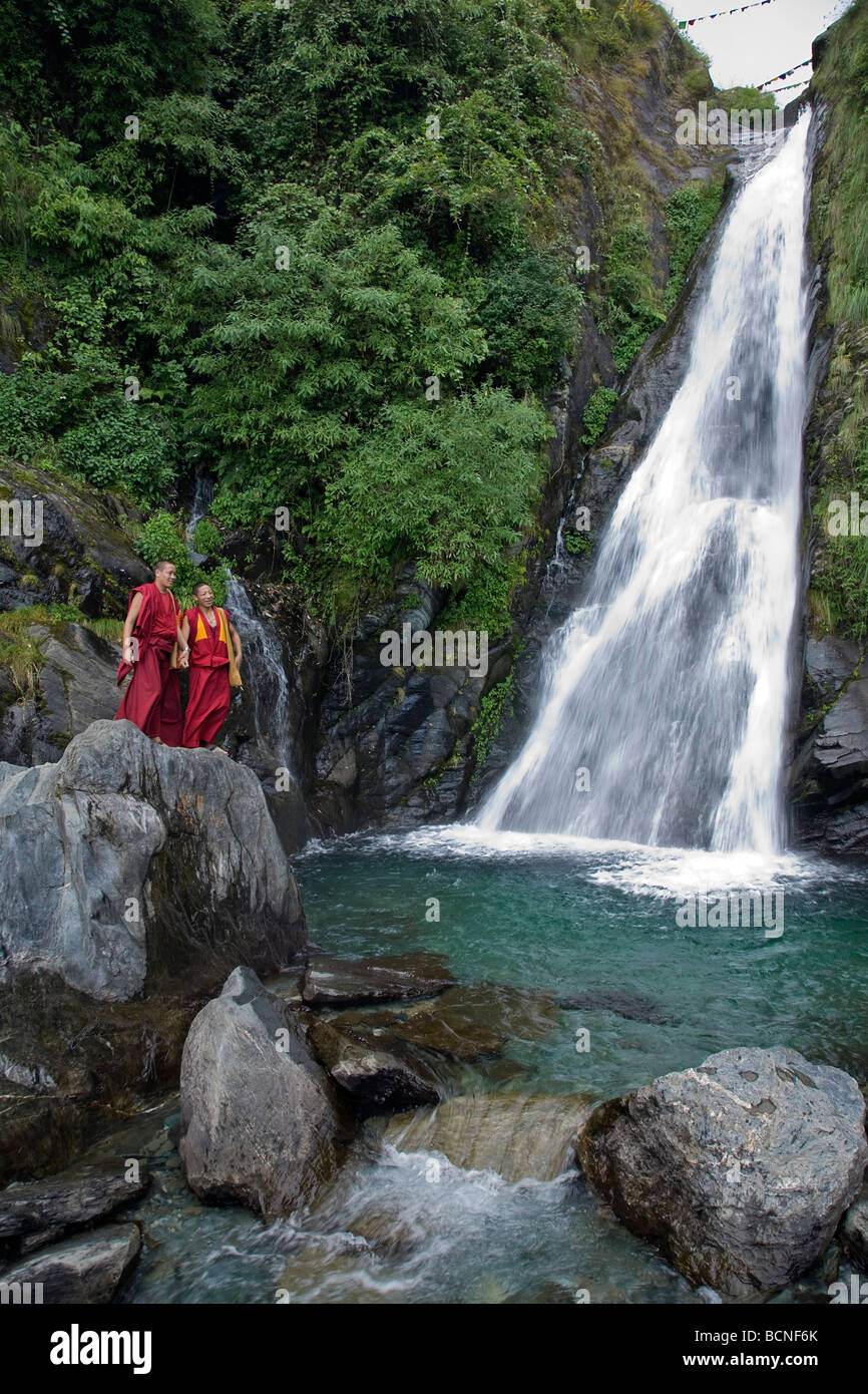 Buddhist monks bhagsu nag waterfall hi-res stock photography and images ...