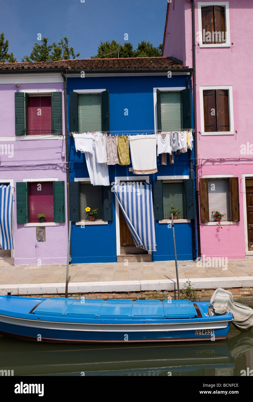 brightly coloured house fronts Stock Photo - Alamy