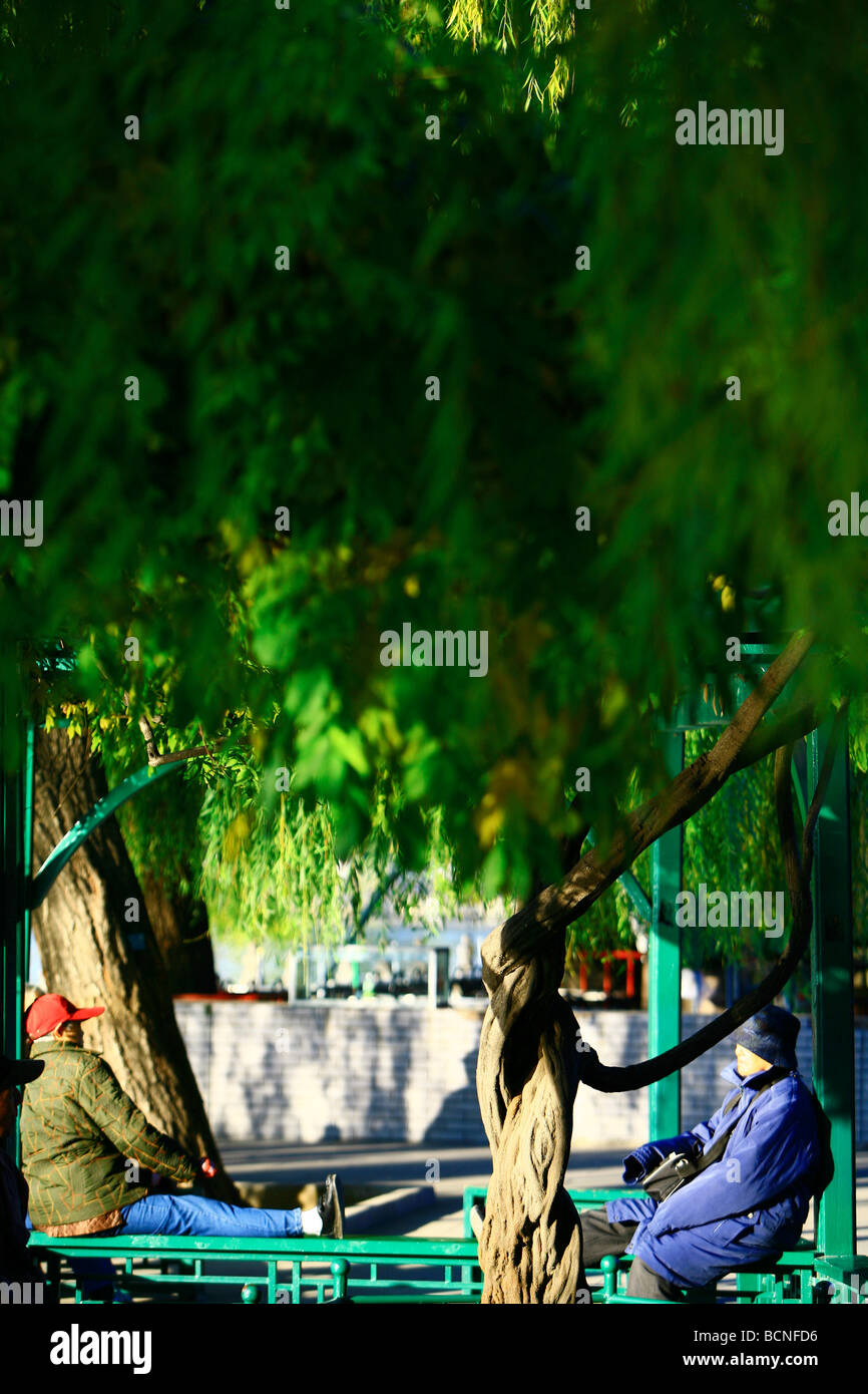 Chinese men resting hi-res stock photography and images - Alamy