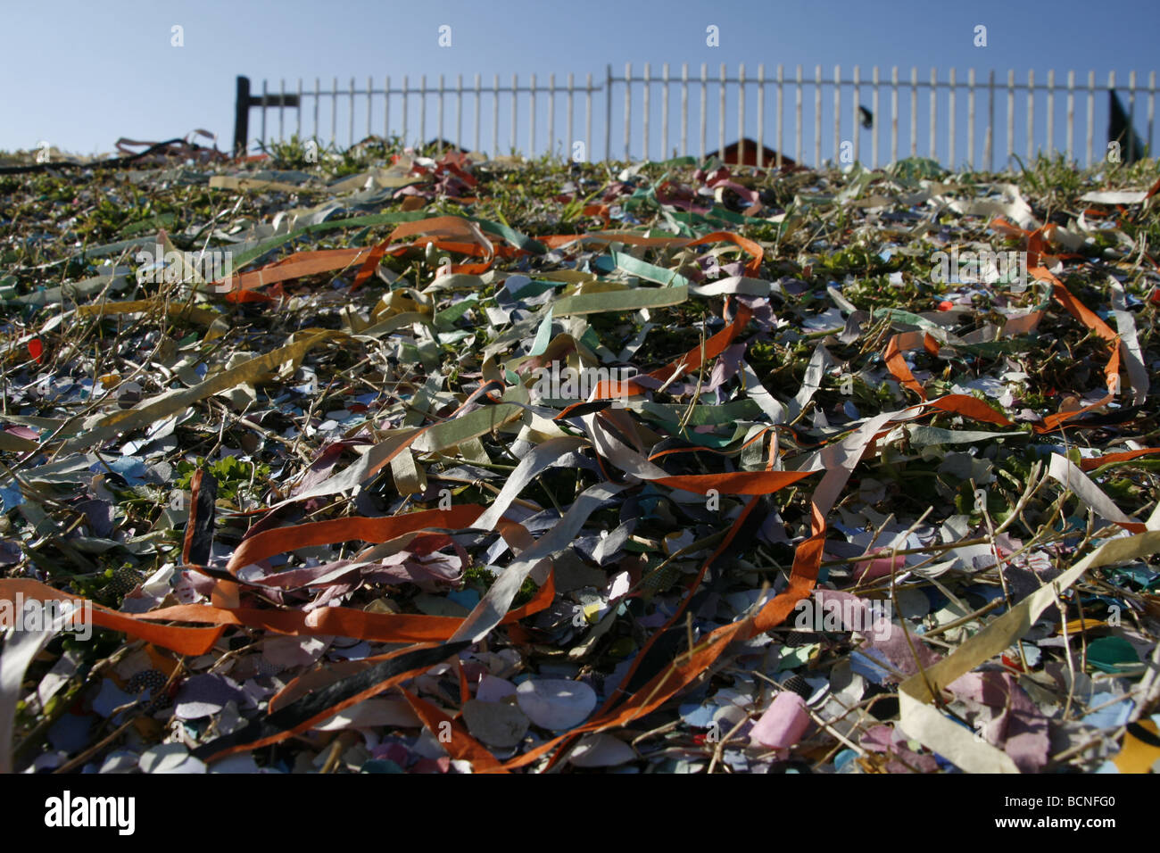 lots of colourful confetti and garlands on grass in field in sun Stock ...