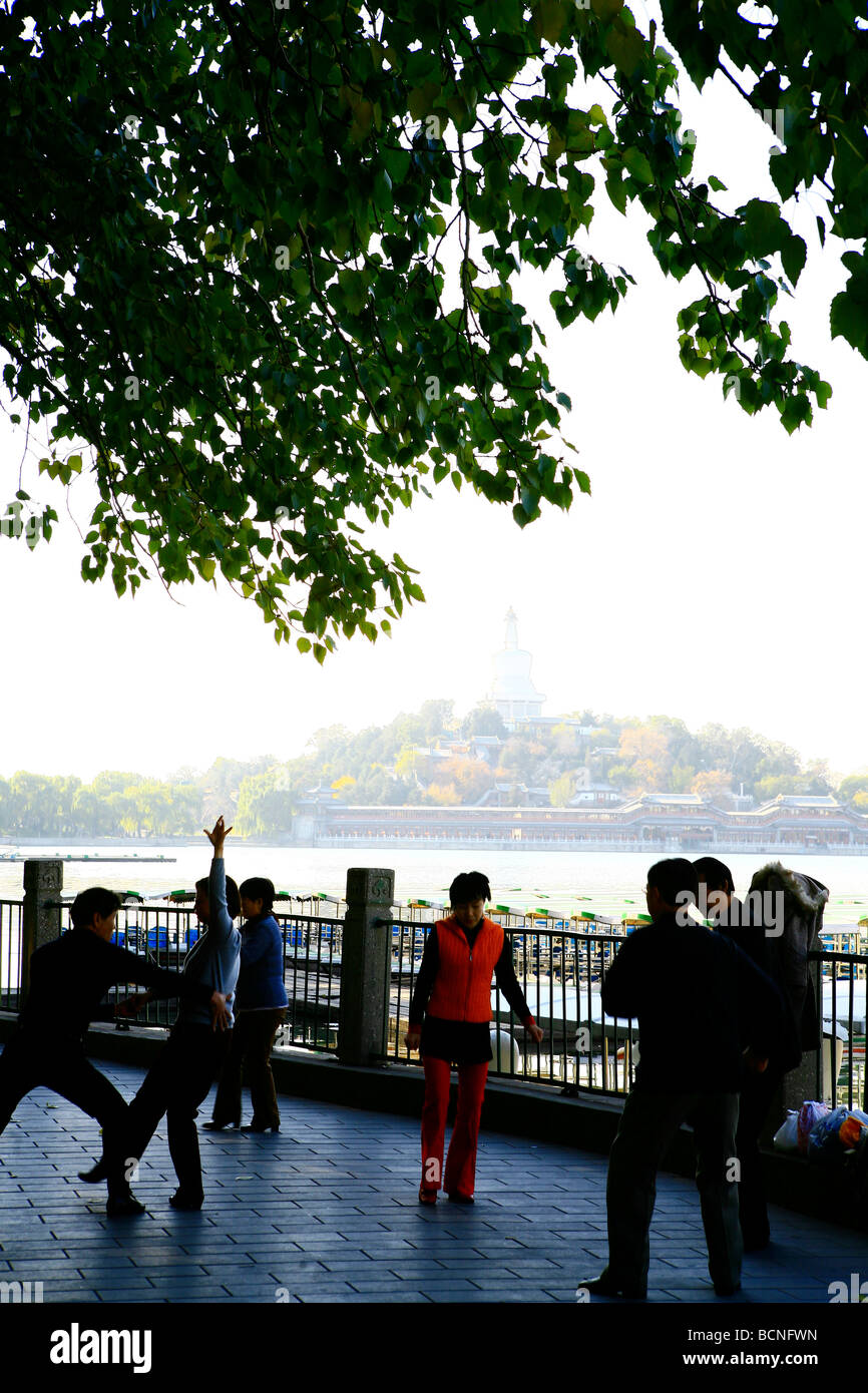 Chinese people practicing dance moves in the morning, Beihai Park ...