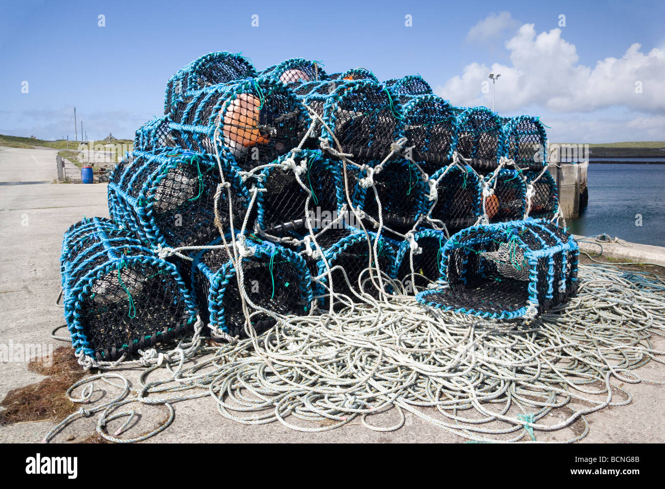 Creels on Berneray harbour, Western Isles, Scotland Stock Photo - Alamy