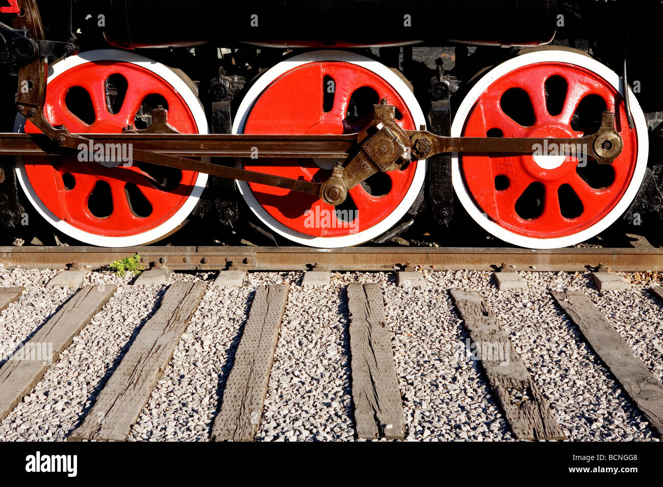 Red and white wheel of the old stream engine train in 798 Art District ...