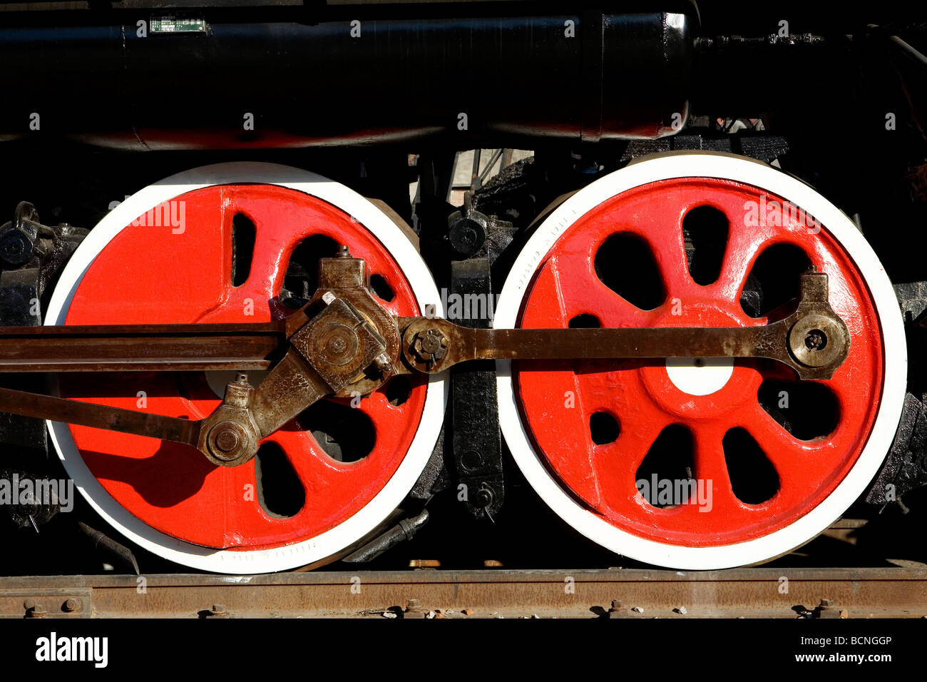 Red and white wheel of the old stream engine train in 798 Art District ...