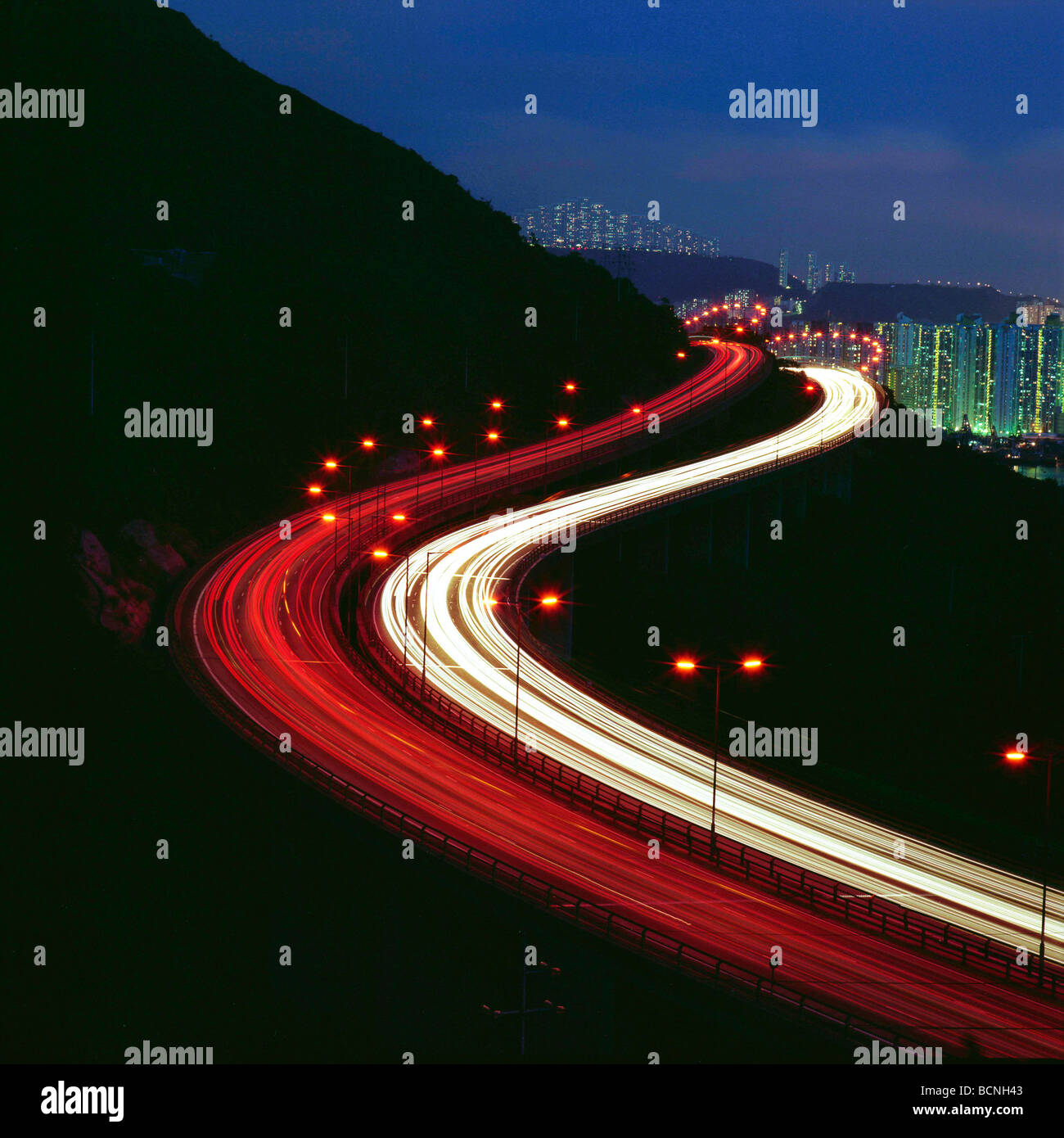Car lights stream down the highway, Hong Kong, China Stock Photo - Alamy