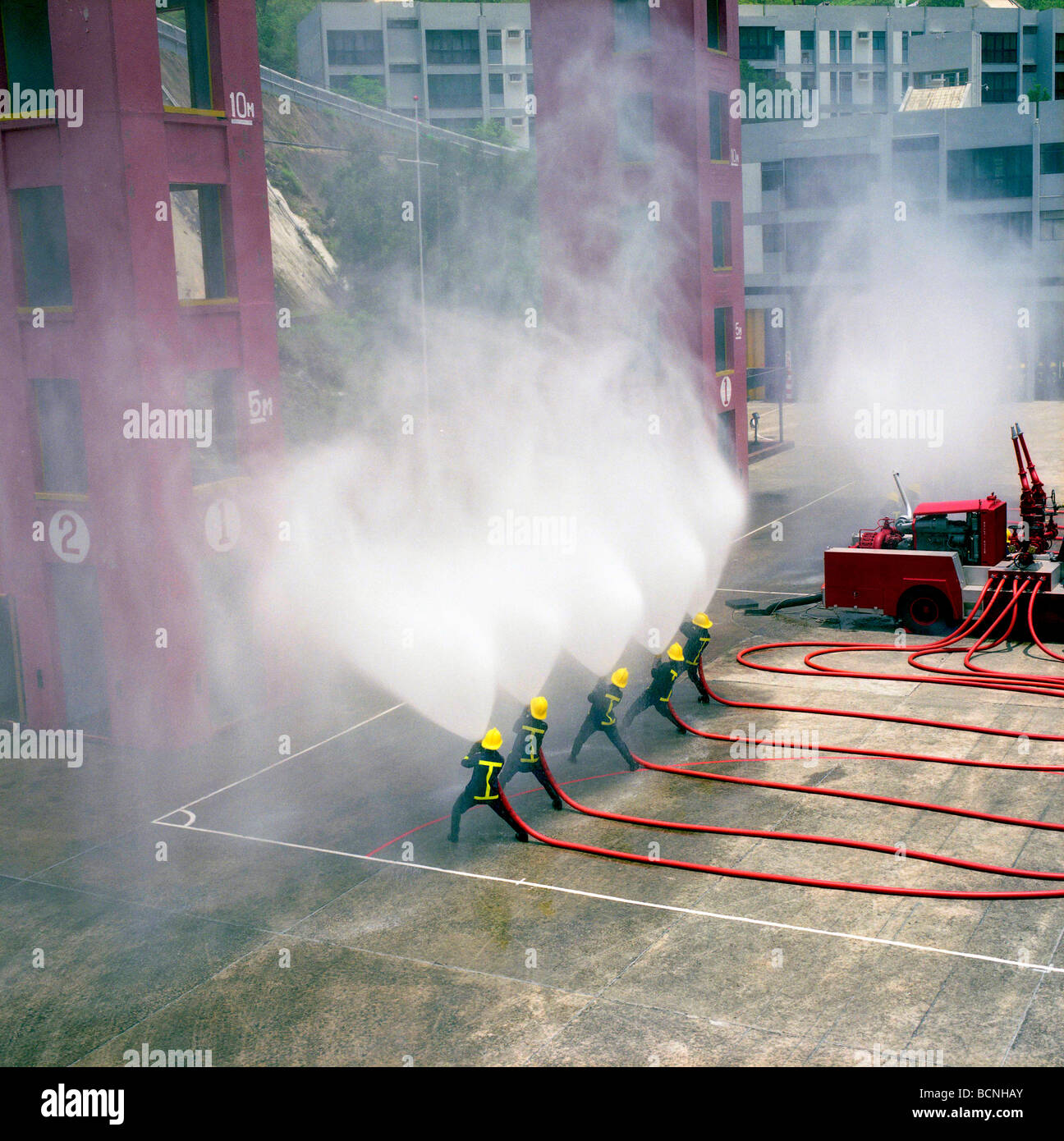 Fire fighters exercising during fire drill, Hong Kong, China Stock ...