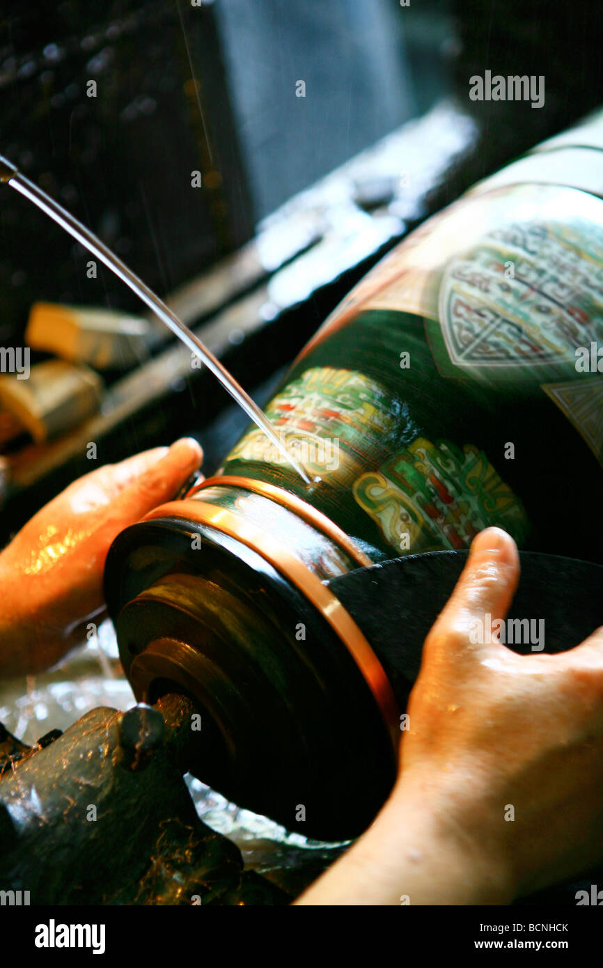 Polishing process when making Cloisonné, Beijing, China Stock Photo - Alamy