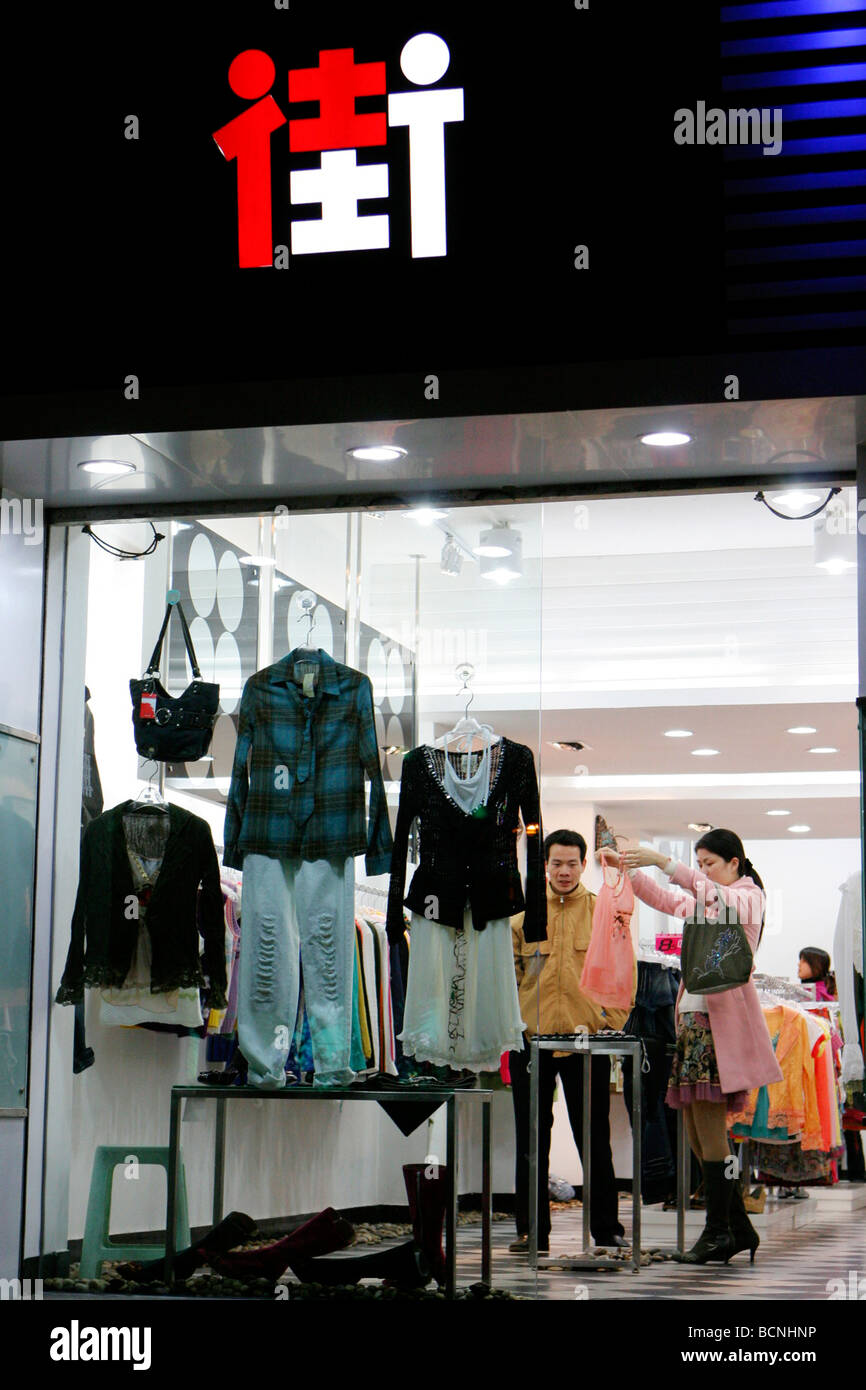 Trendy Chinese couple shopping in department store, Xiamen, Fujian ...