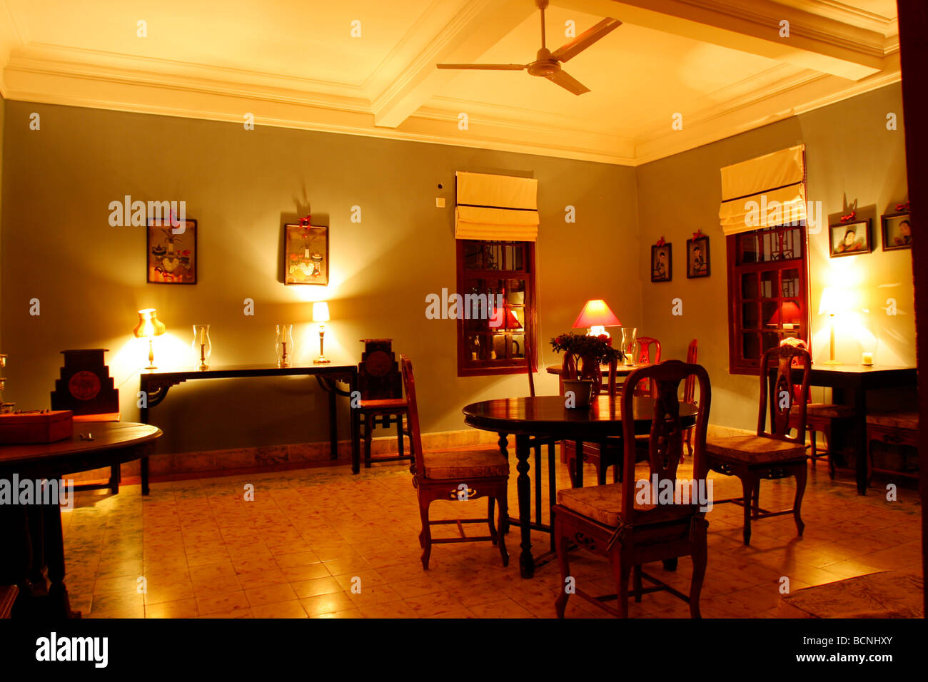 Corner of a richly decorated guestroom in Night Lily Guest House ...