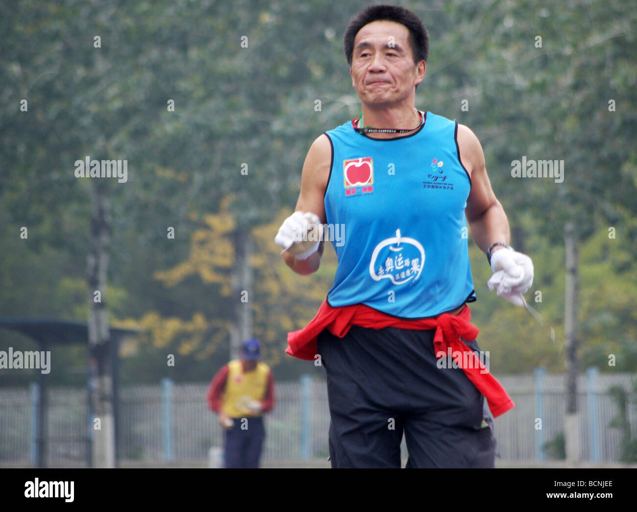 Mid-aged man running in the morning, Beijing, China Stock Photo - Alamy