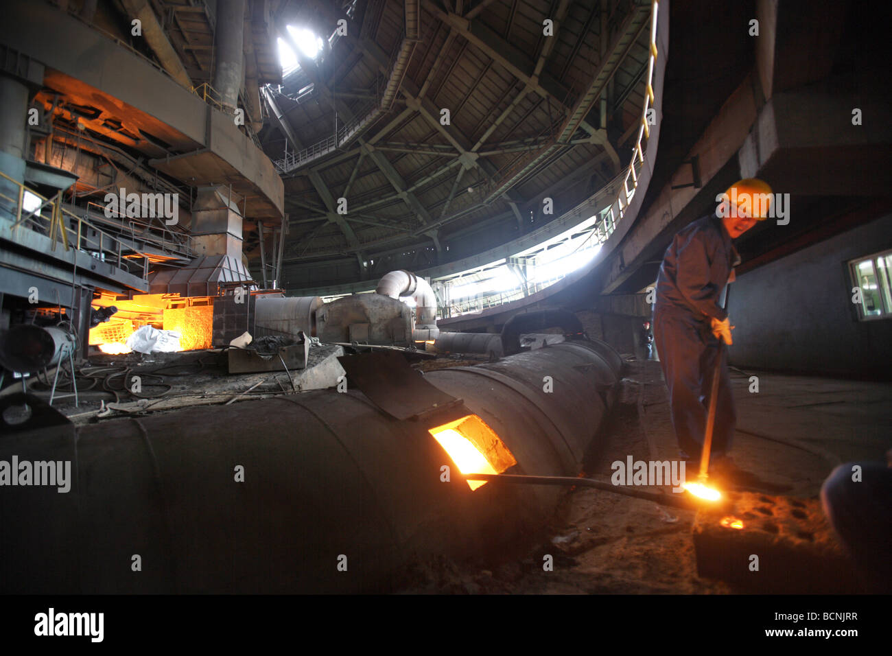 Workers working in steel mill of Shougang Group, Beijing, China Stock ...