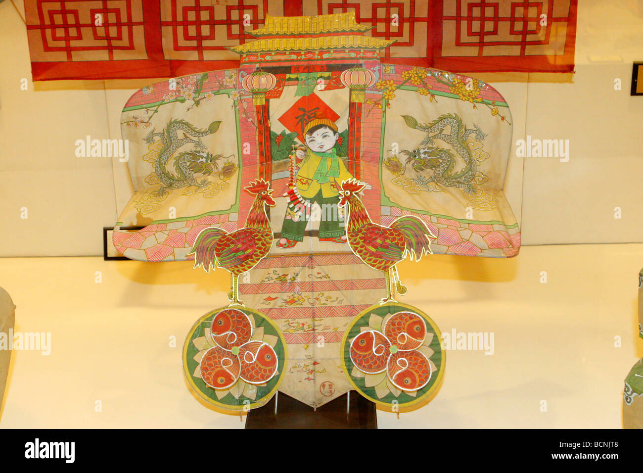 Kite with child, dragon and rooster design, The Kite Museum, Weifang ...