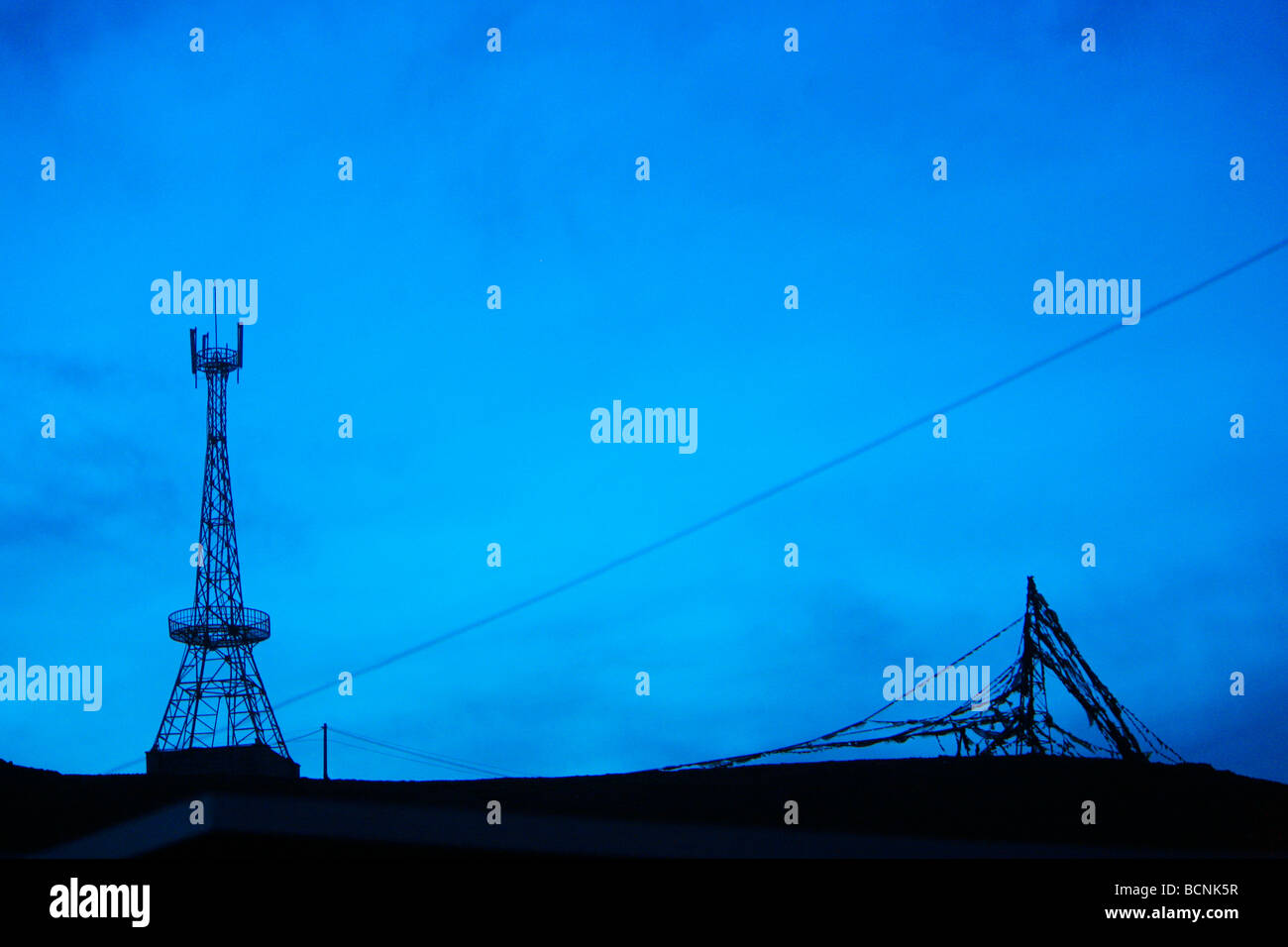 Mobile telecom signal tower at dusk, Tibet Autonomous Region, China ...