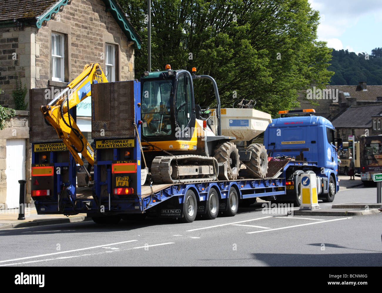 An articulated lorry on a narrow street in the U.K Stock Photo - Alamy