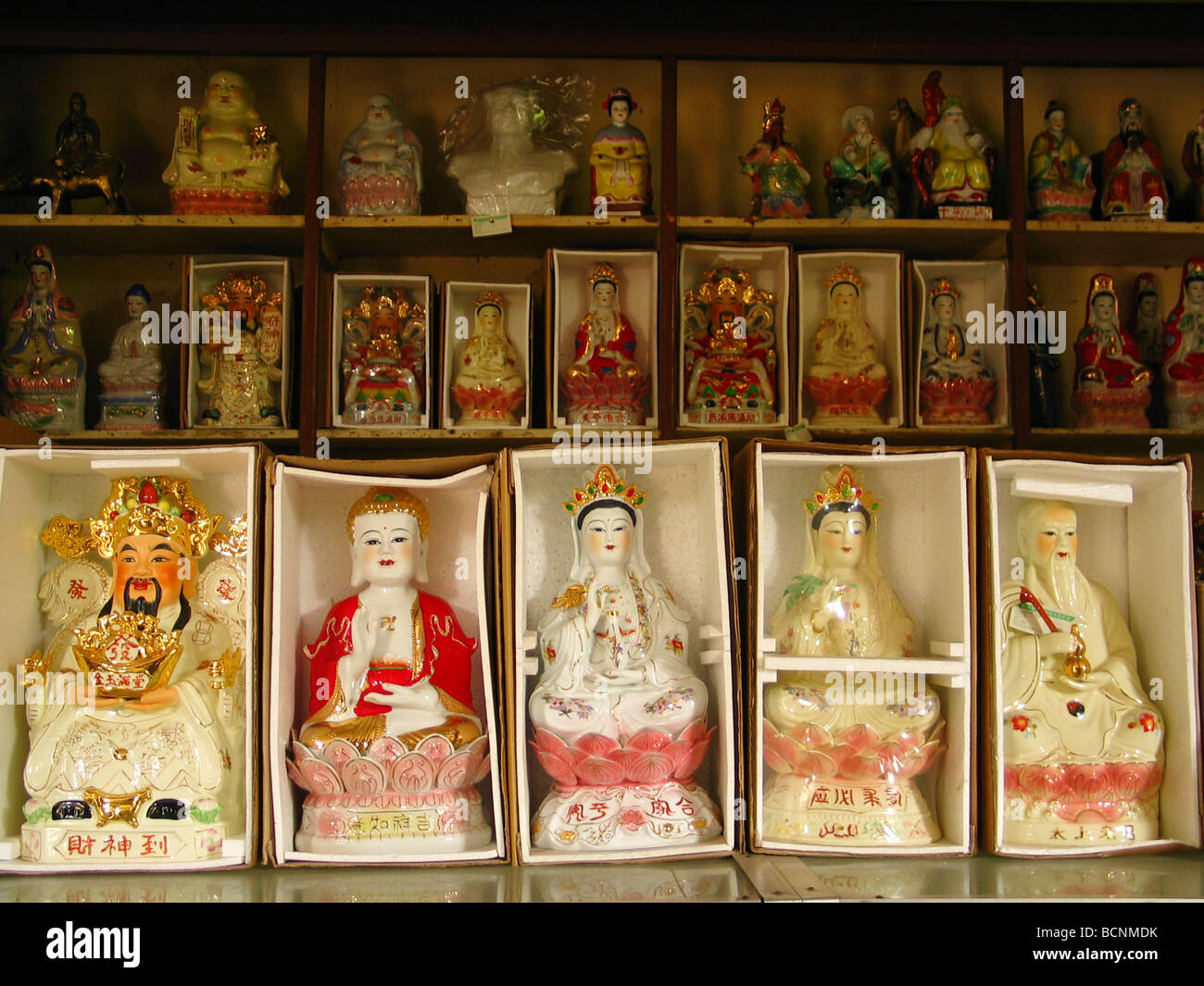 Boxes of Buddha statues displayed in the store in Shaolin Temple, Henan ...