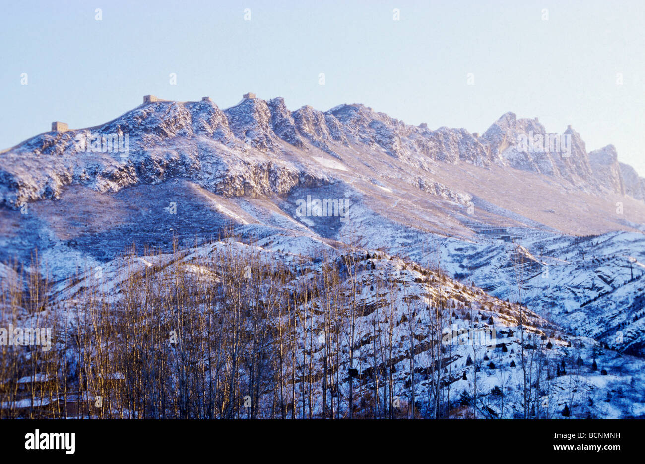 Simatai Great Wall built on the ridge of steep mountain in winter ...