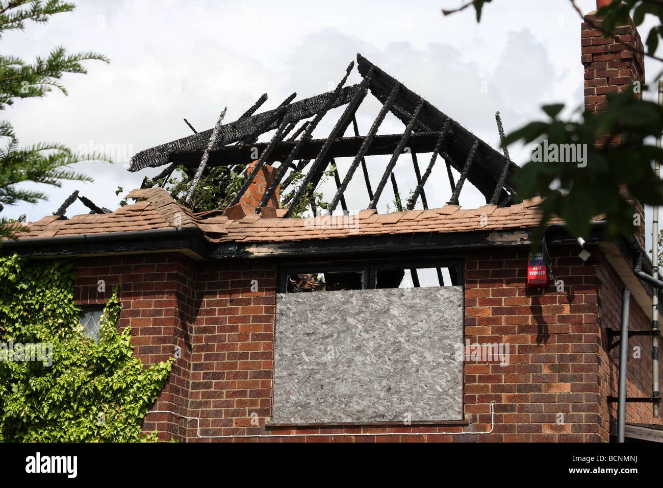 A fire damaged house Stock Photo - Alamy