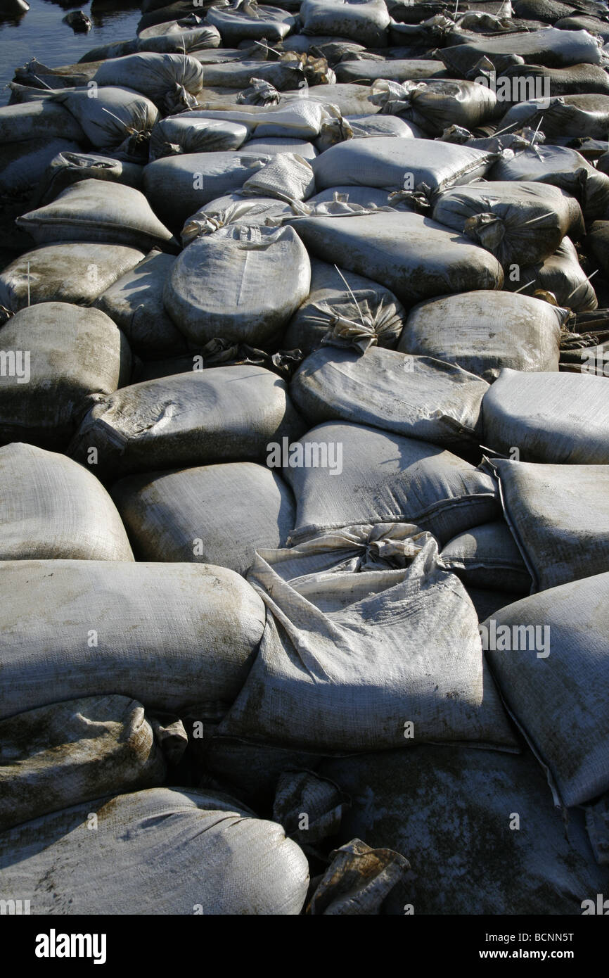 sand bags used as barrier on sea shore Stock Photo - Alamy