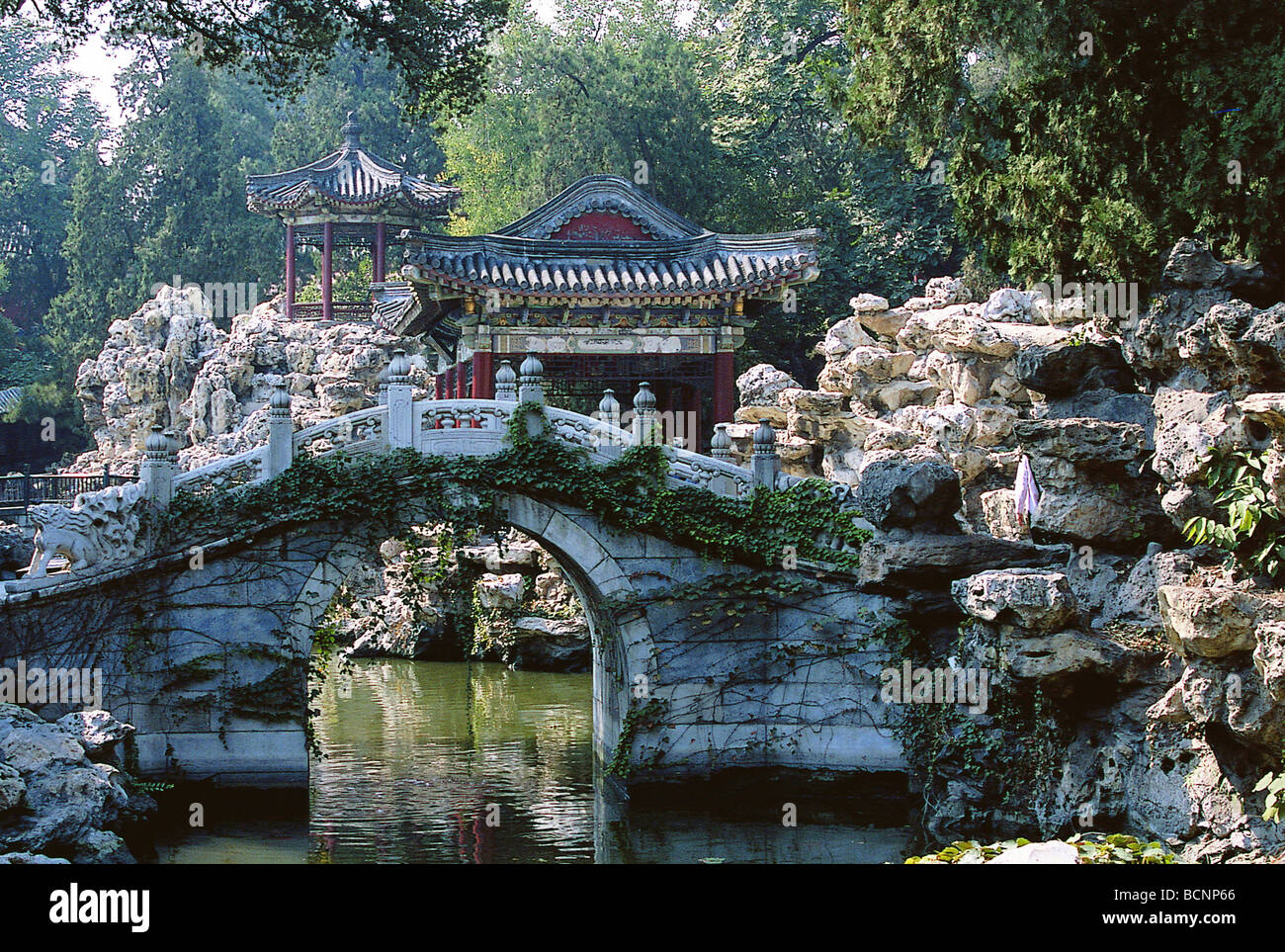 Stone bridge and pavilion in the Jing Xin Zhai in the Beihai Park ...