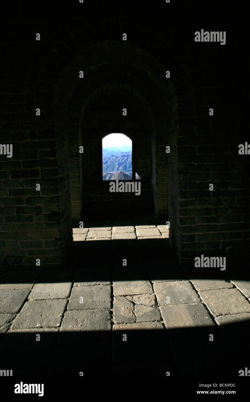 Sunlight shining through gate of a beacon tower, Jinshanling Great Wall ...