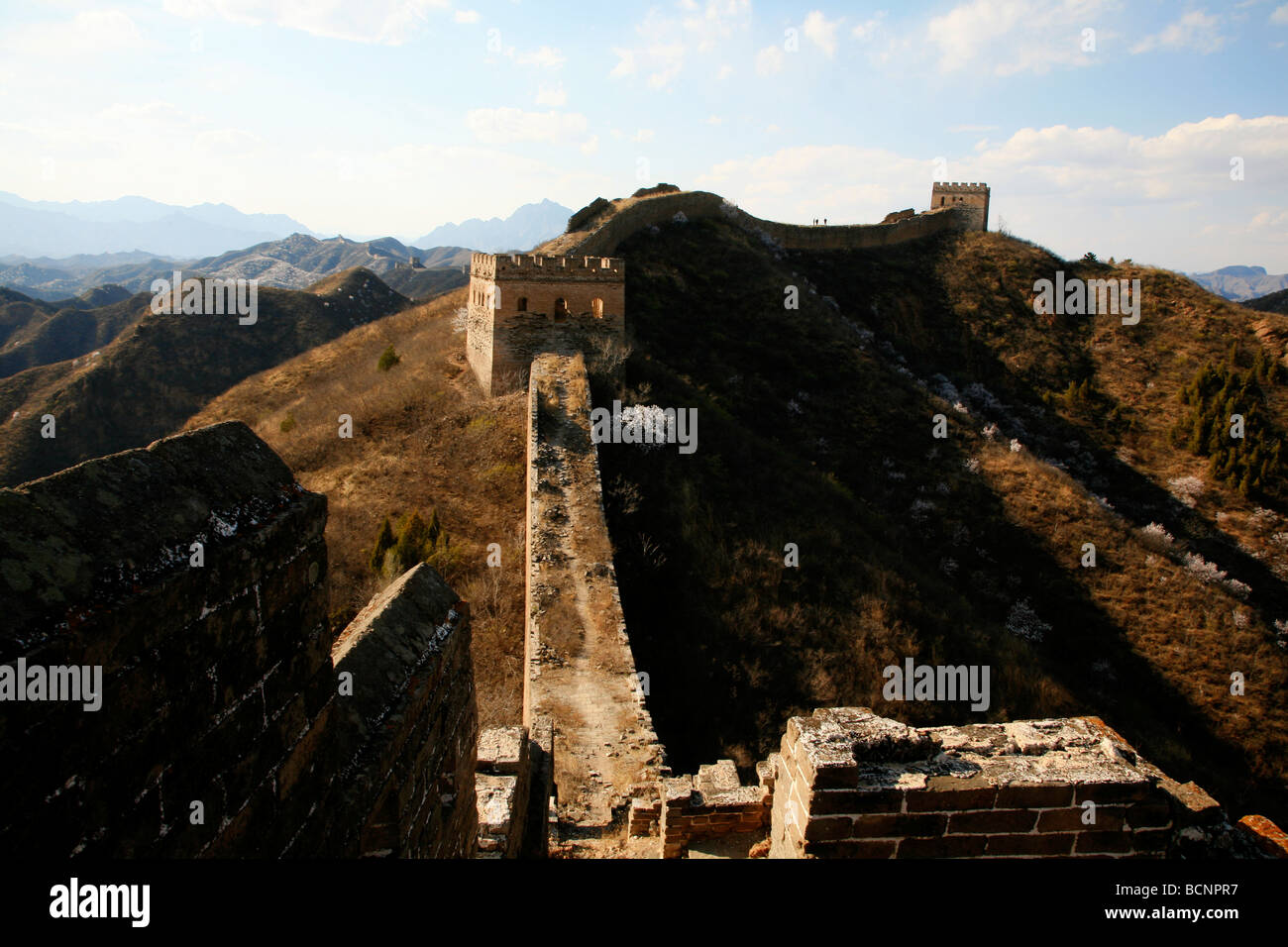 Damaged brick wall and beacon towers on Jinshanling Great Wall, Hebei ...