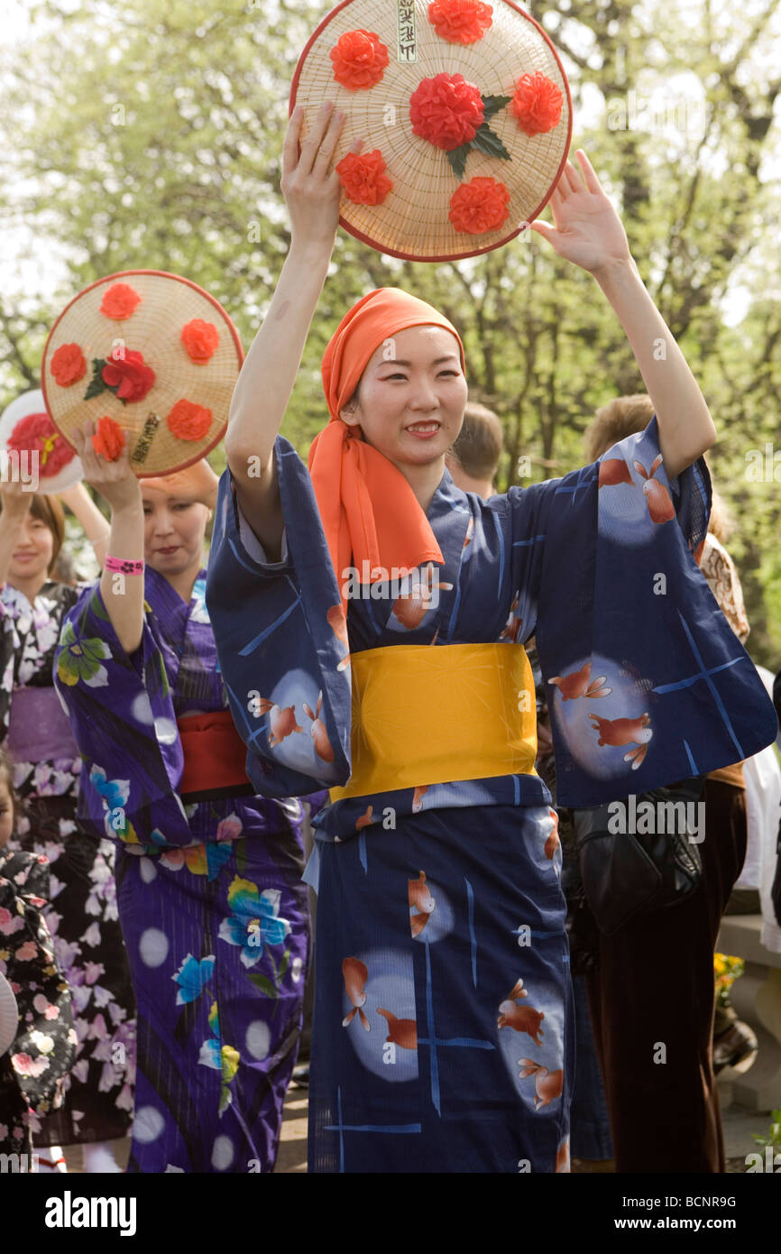 Members of a Japanese folk dance group perform at Sakura Matsuri, the ...