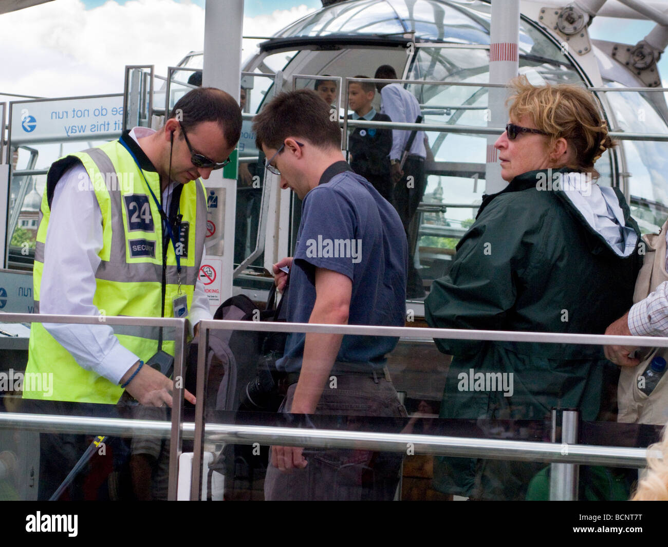 Officer searching bag passenger hi-res stock photography and images - Alamy