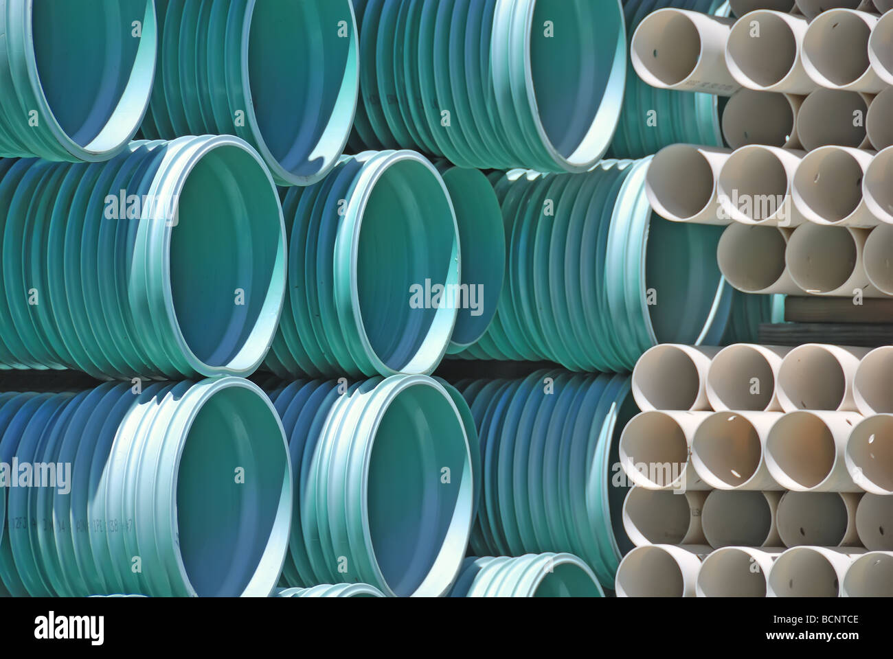 Stacked PVC piping Stock Photo - Alamy