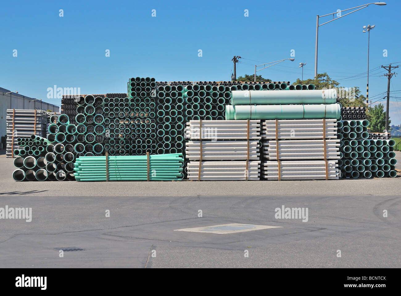 Stacked PVC piping Stock Photo - Alamy
