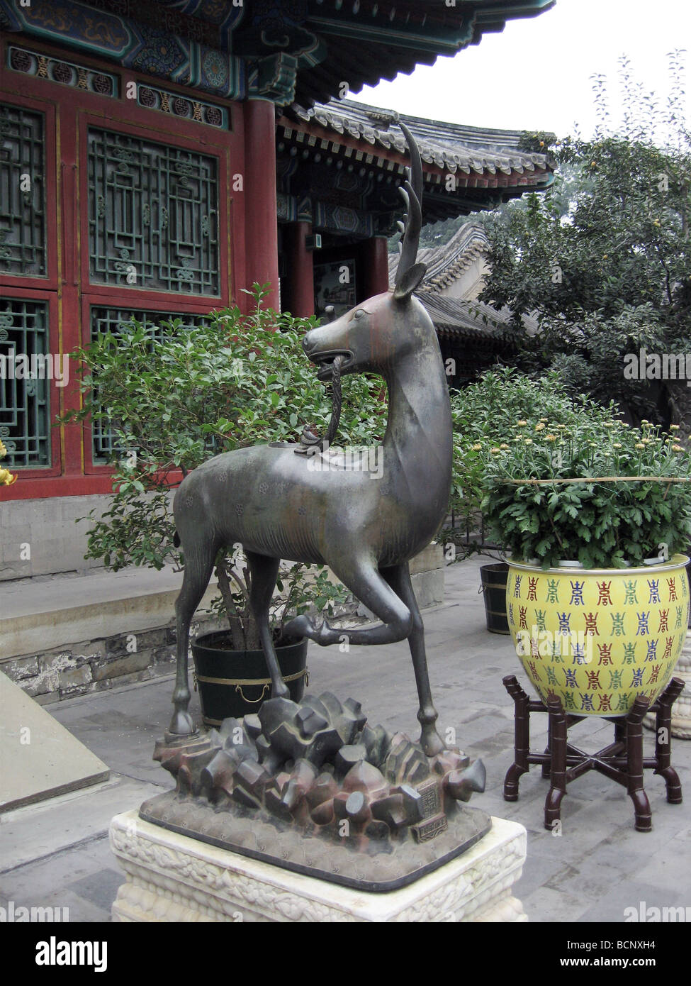 Bronze statue in front of Hall of Joyful Longevity in the Summer Palace ...