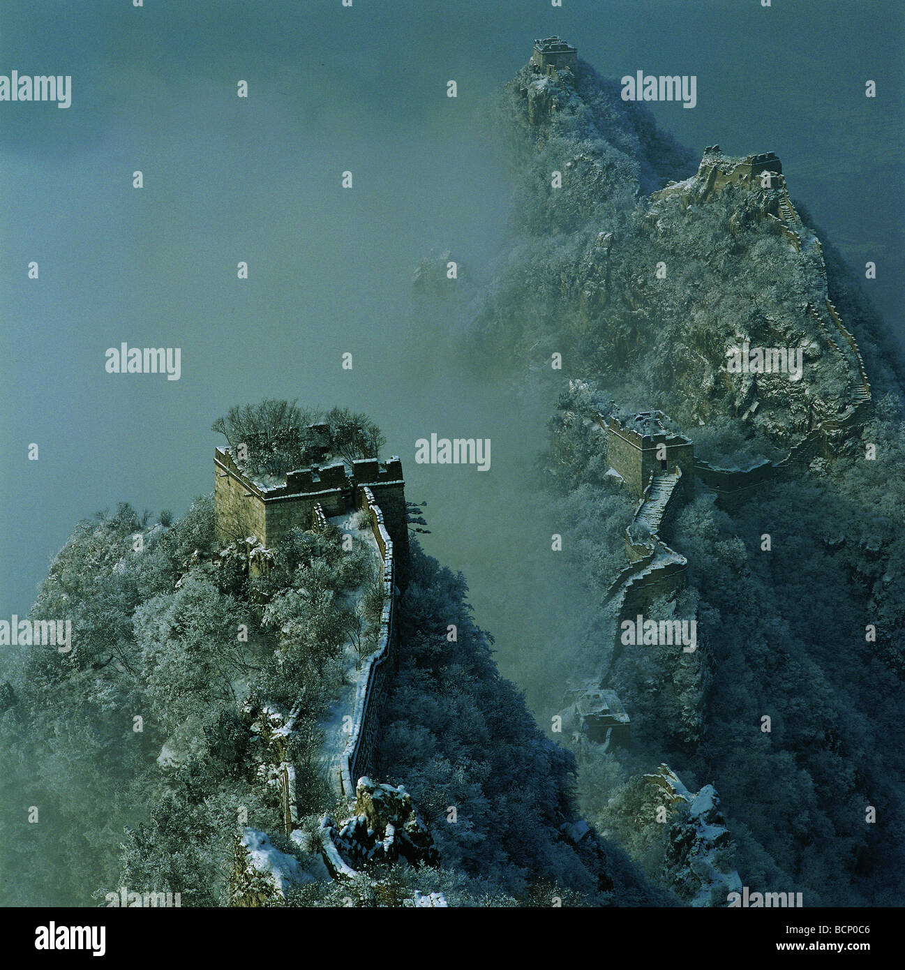 Jiankou Great Wall winding through steep mountain range in winter ...