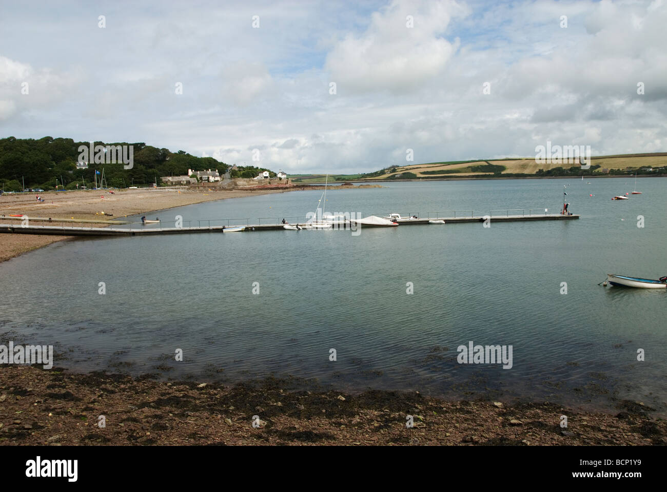 Pembrokeshire Wales Dale beach at low tide with pontoon going into sea ...