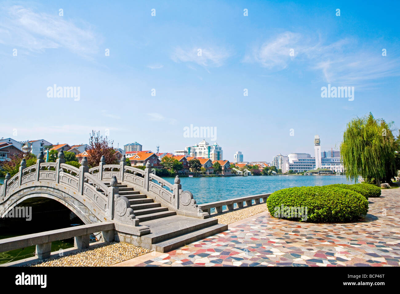 Serene landscape among modern buildings, Hefei, Anhui Province, China ...