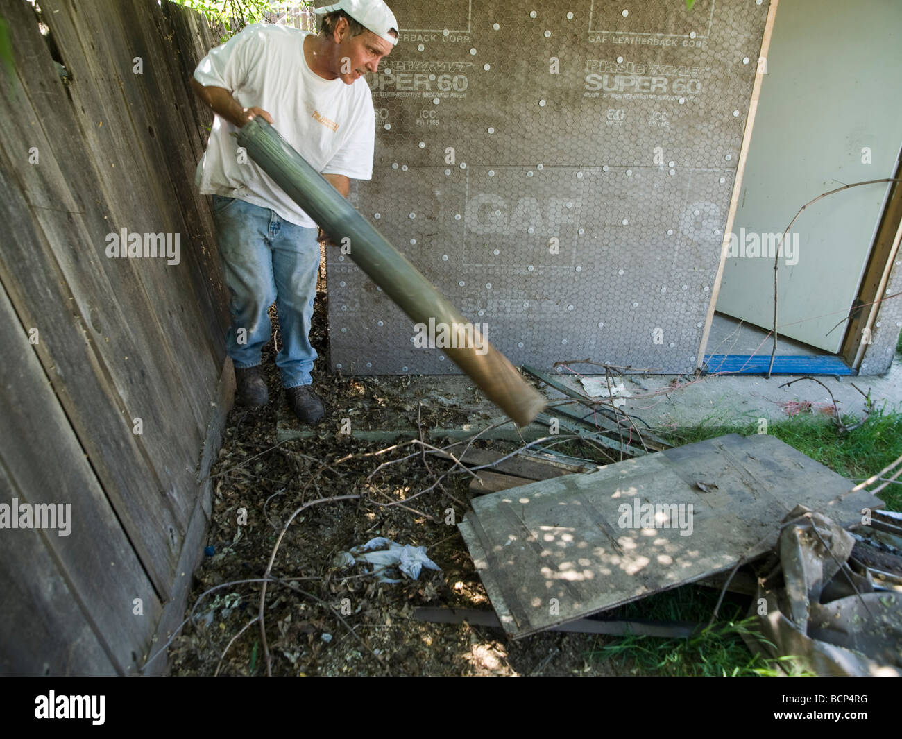 Thomas Longmore and his crew of AAA restoration clean up a bank owned ...