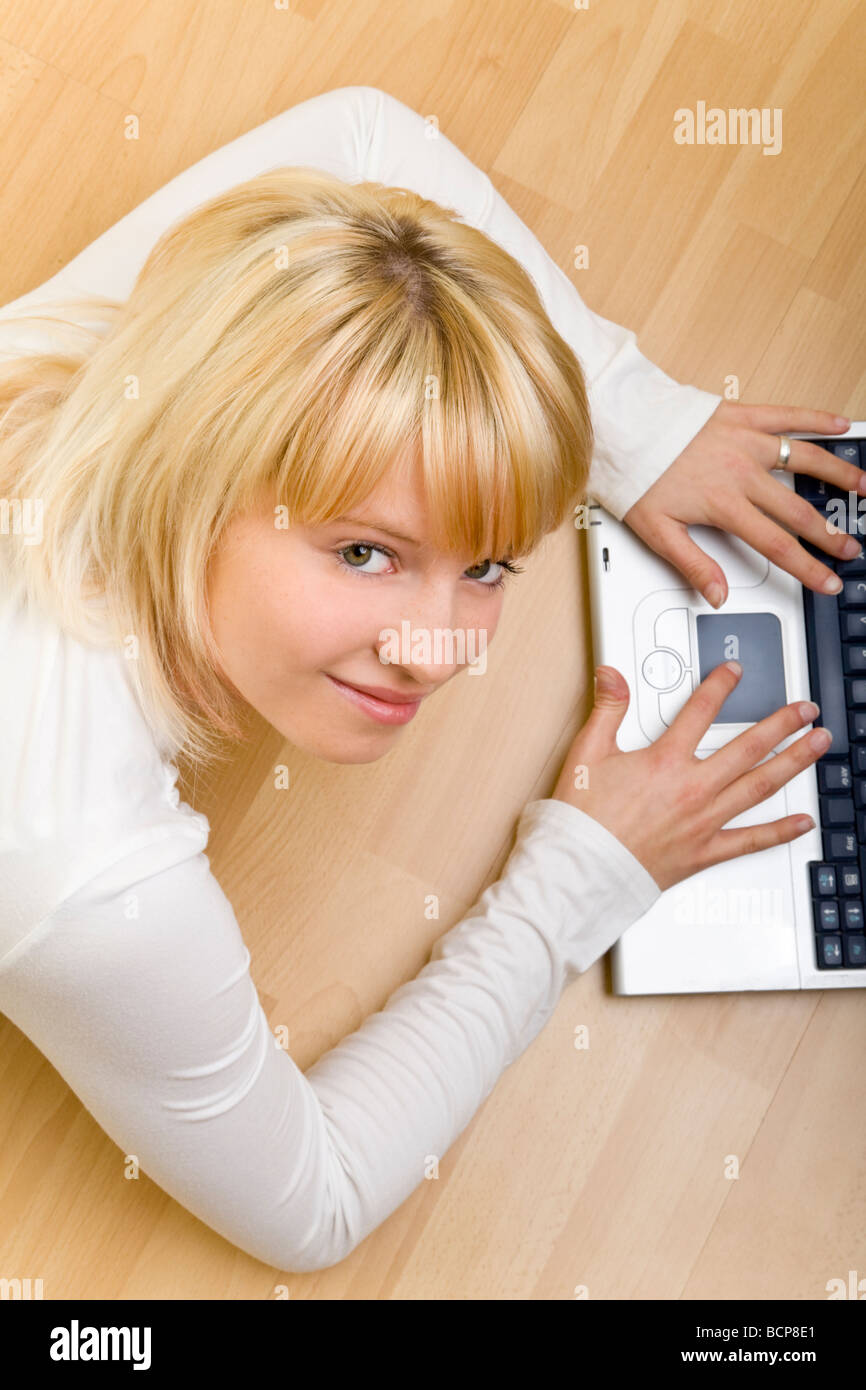 young female student works with laptop Stock Photo - Alamy