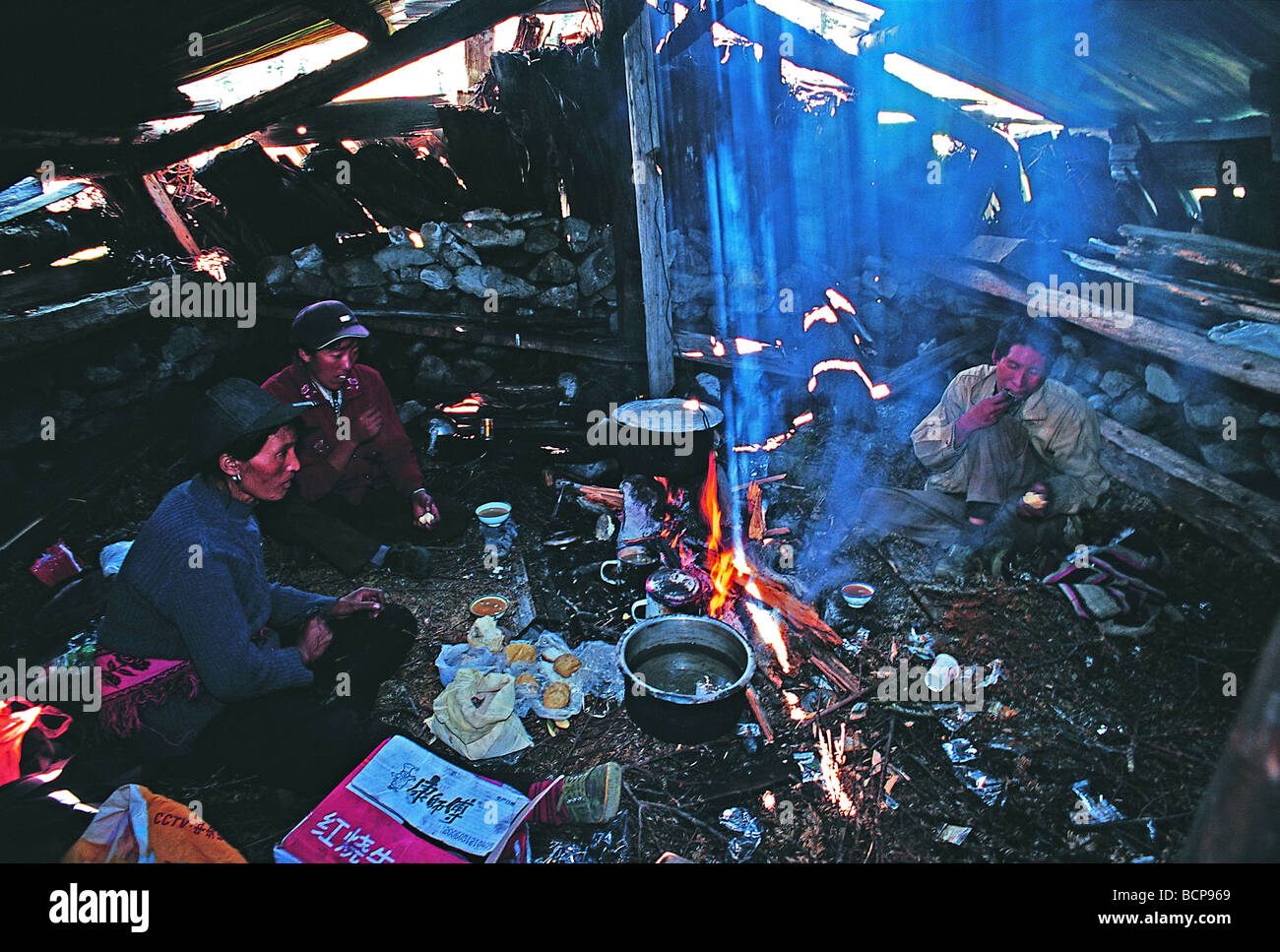 Sitting beside fire hi-res stock photography and images - Alamy