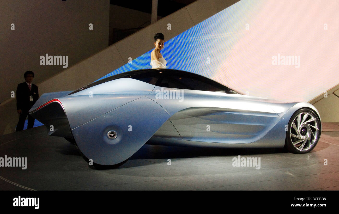Beautiful Asian car model posing beside a conceptual car, 2008 Beijing ...